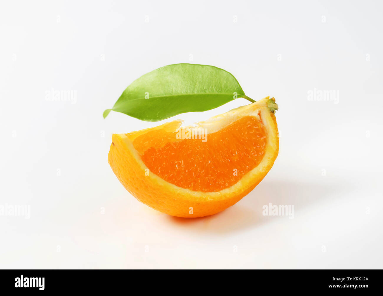 Fresh orange quarter Stock Photo - Alamy