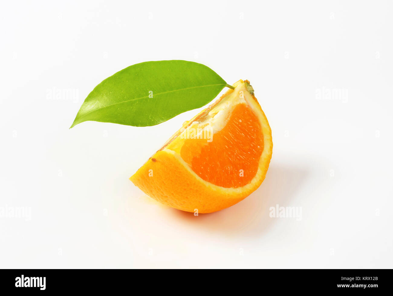 Fresh orange quarter Stock Photo - Alamy