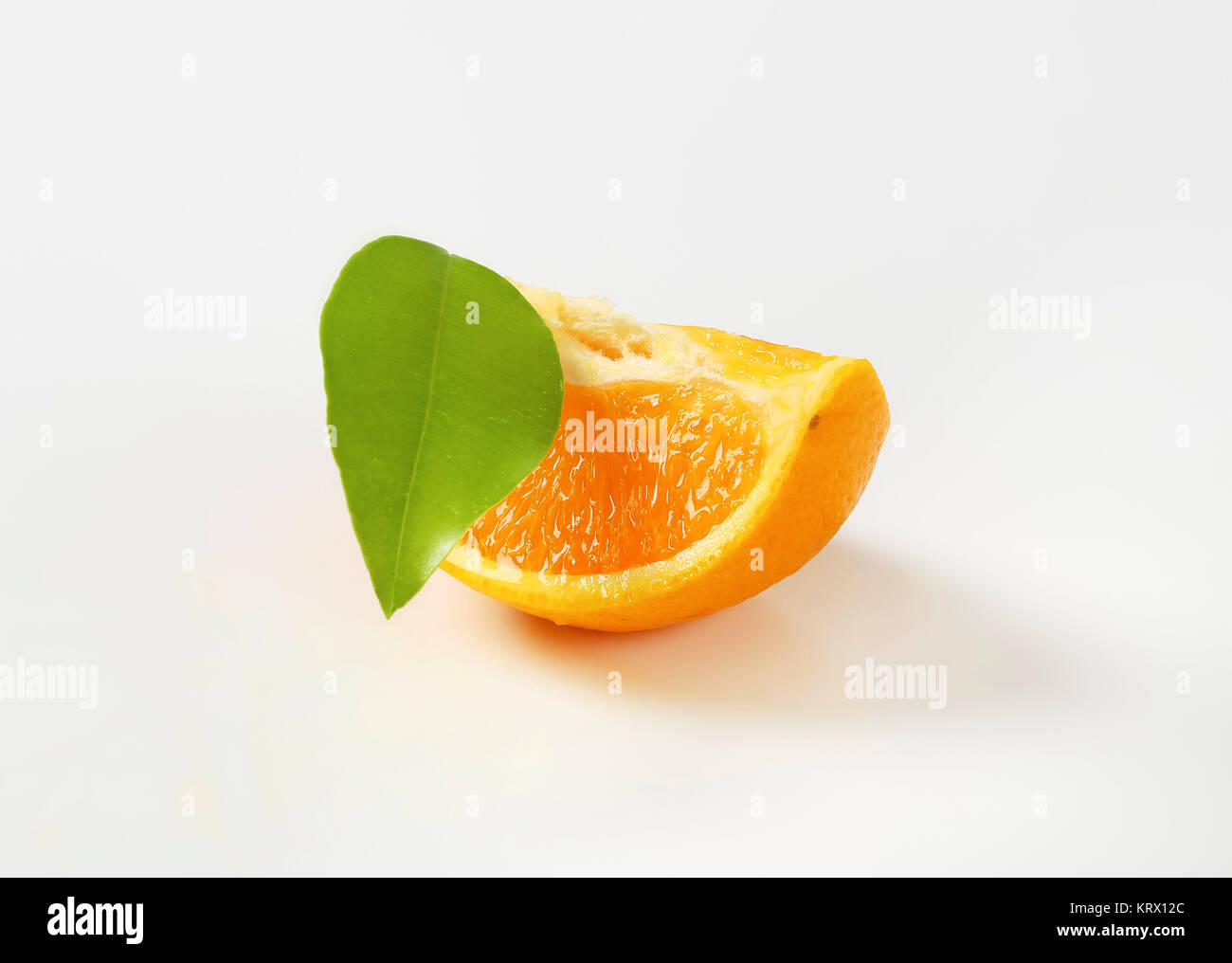 Fresh orange quarter Stock Photo - Alamy