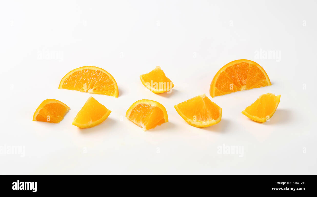 Fresh orange pieces Stock Photo - Alamy