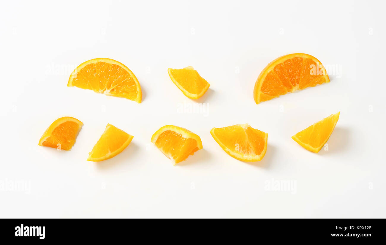 Fresh orange pieces Stock Photo - Alamy