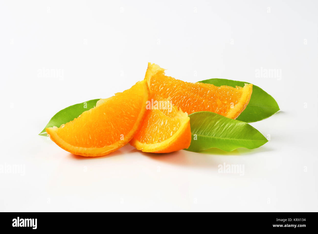 Fresh orange wedges Stock Photo - Alamy