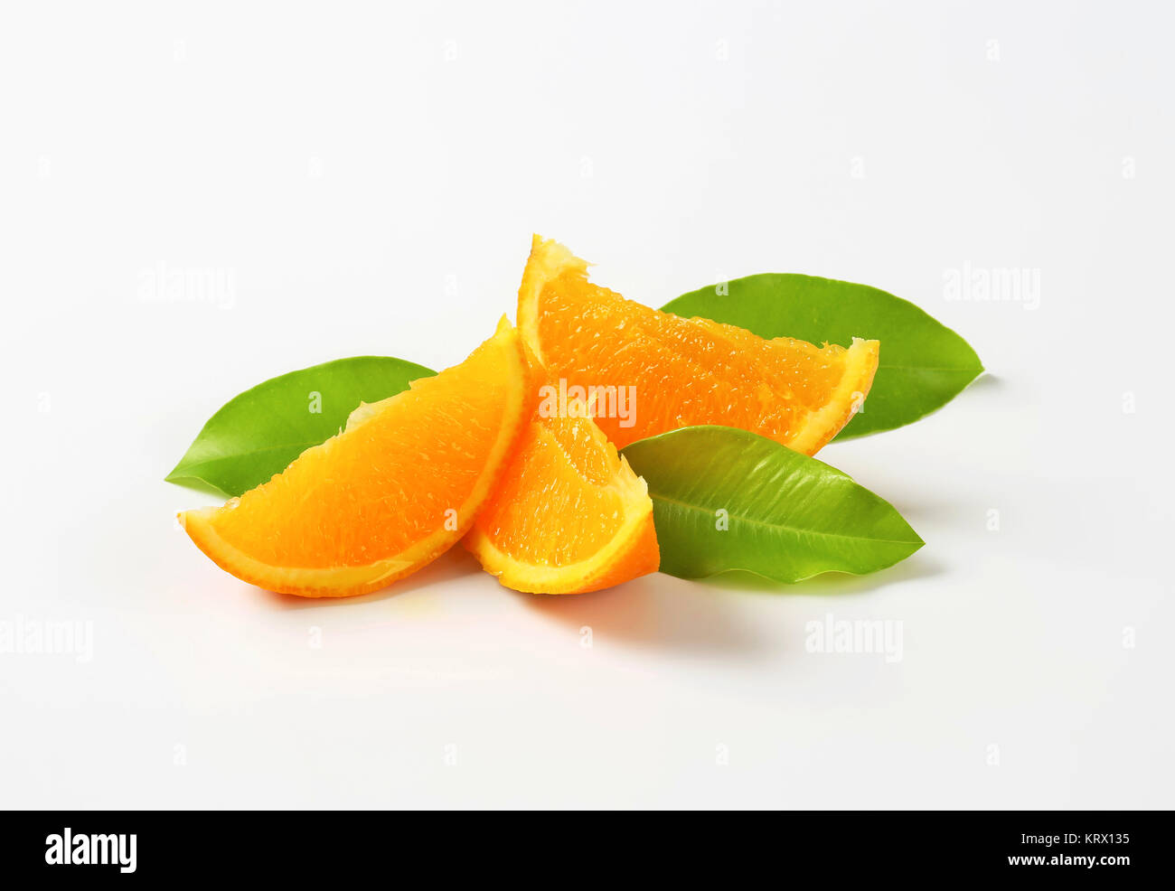 Fresh orange wedges Stock Photo - Alamy