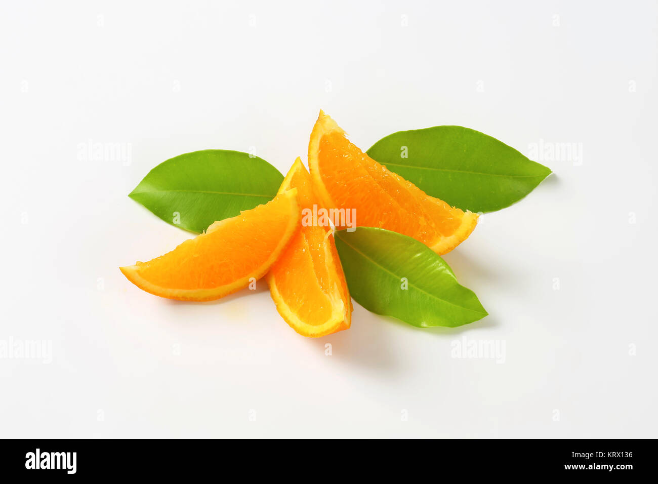 Fresh orange wedges Stock Photo - Alamy