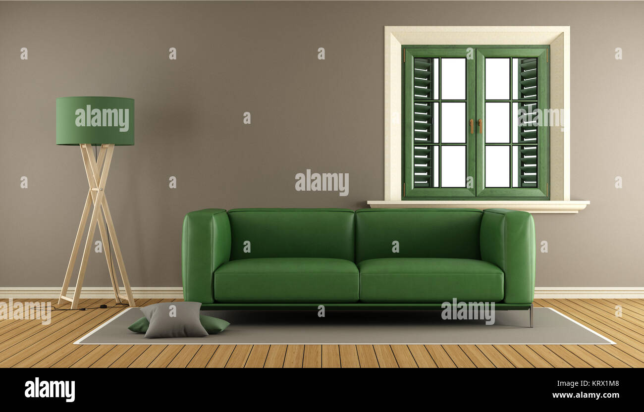 Living room with sofa and window Stock Photo - Alamy