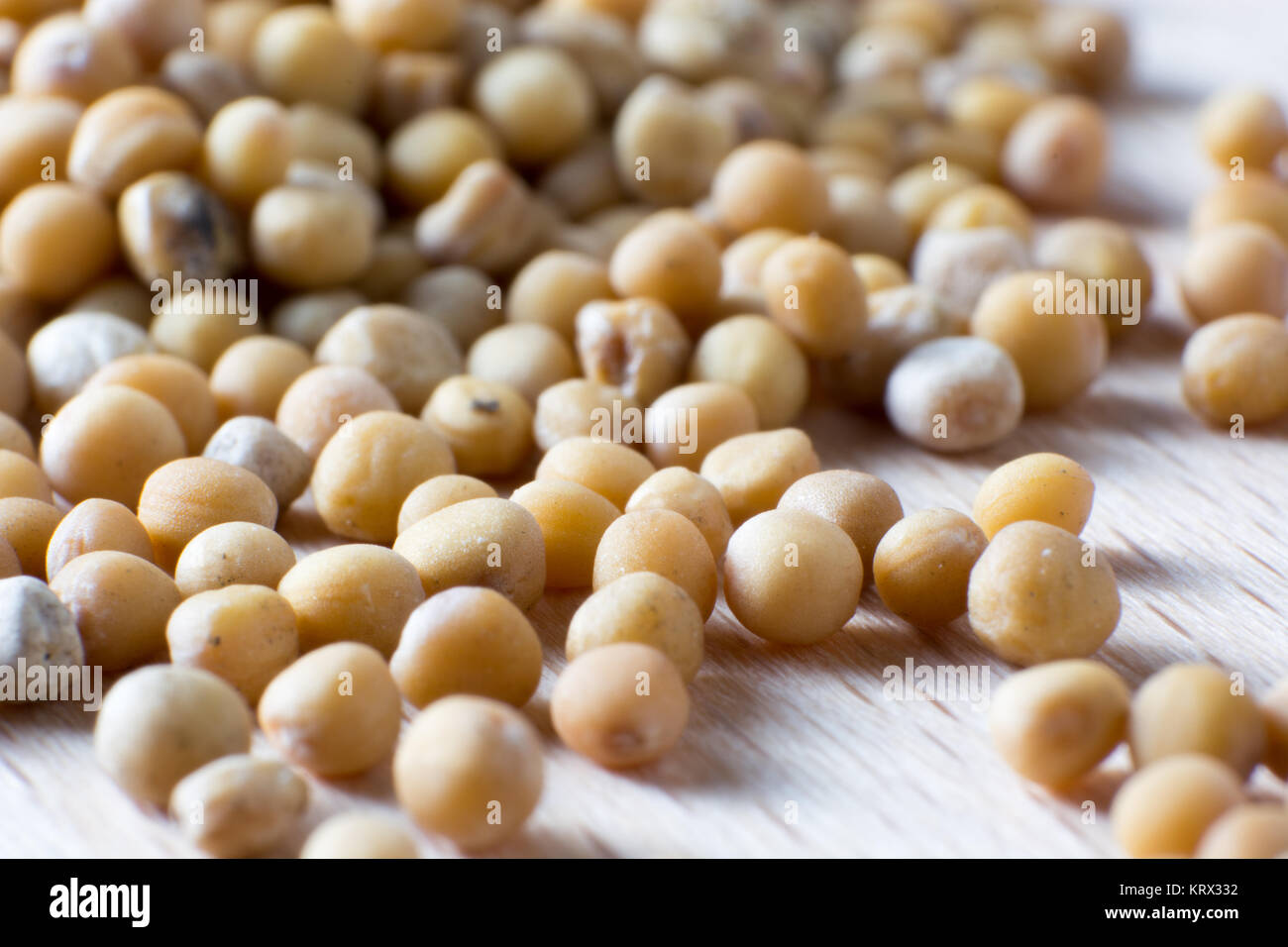 Pile of millet on wooden table Stock Photo - Alamy