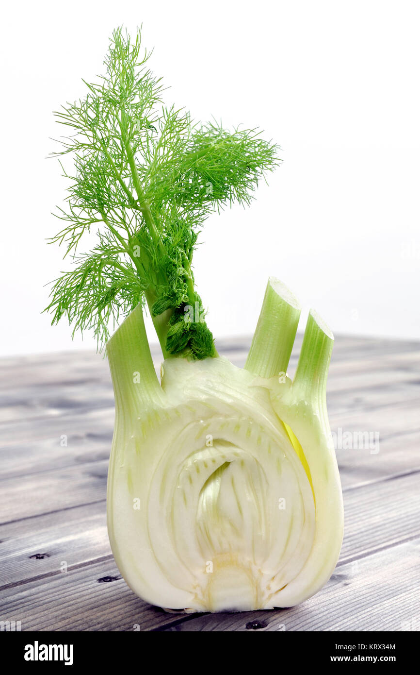 Fresh fennel cut just harvested, photographed on wooden table Stock ...