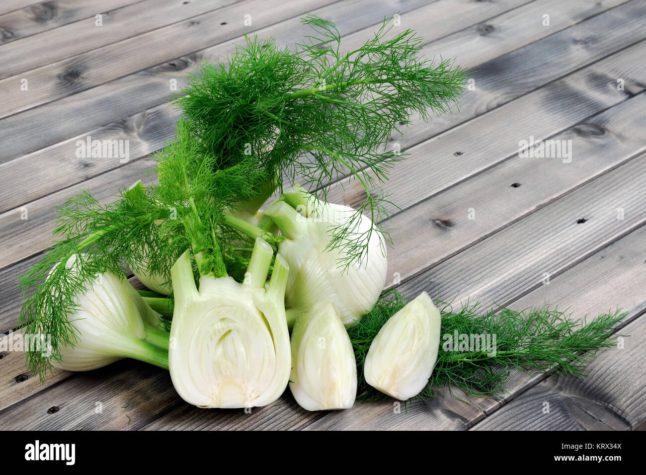 Fresh fennel cut just harvested, photographed on wooden table Stock ...