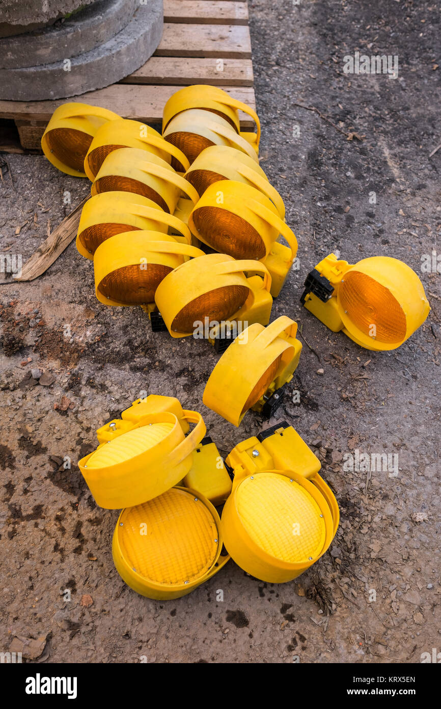 yellow warning lights on the floor of a building site Stock Photo - Alamy