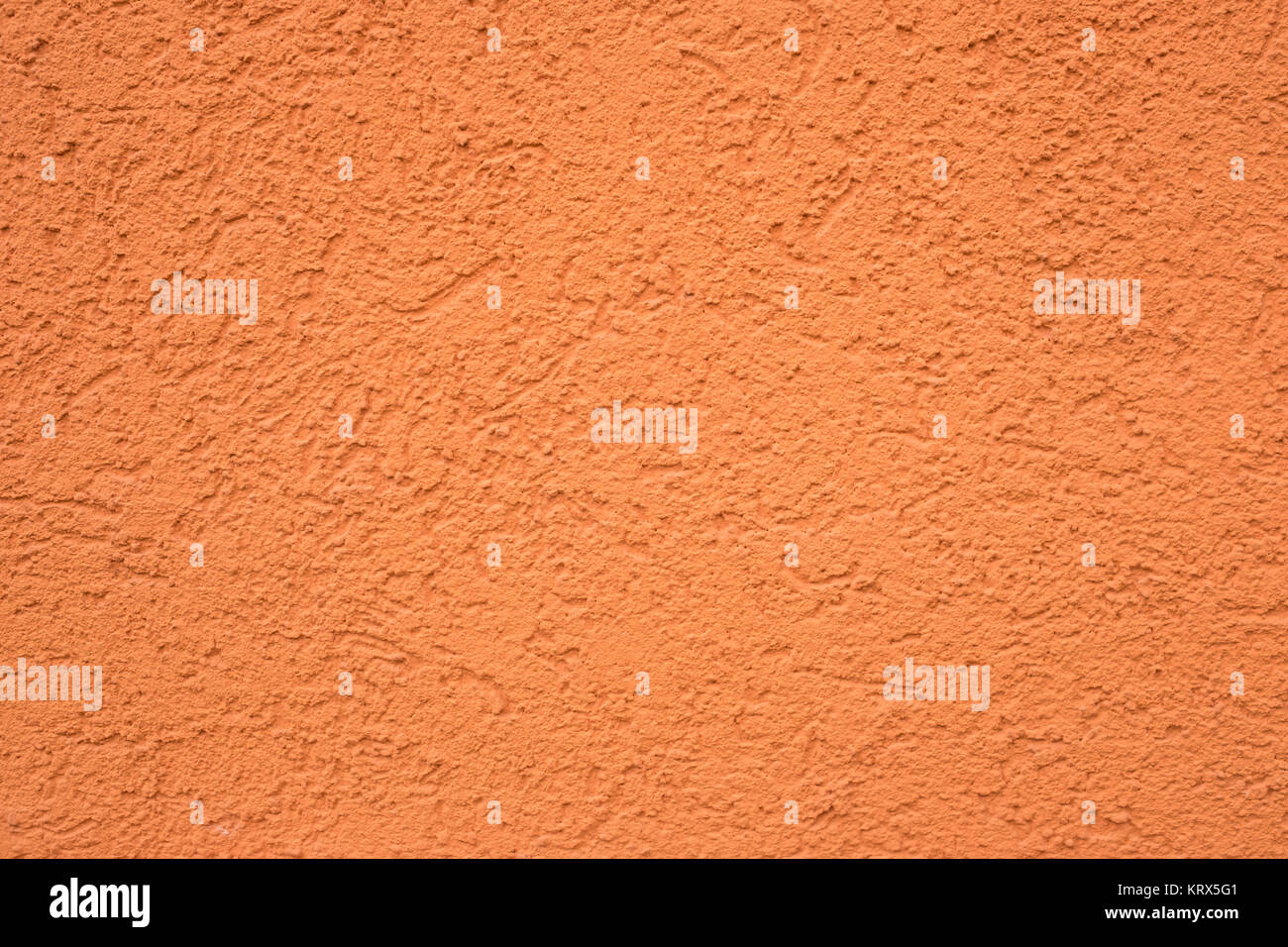 plaster with coarse texture in orange Stock Photo - Alamy