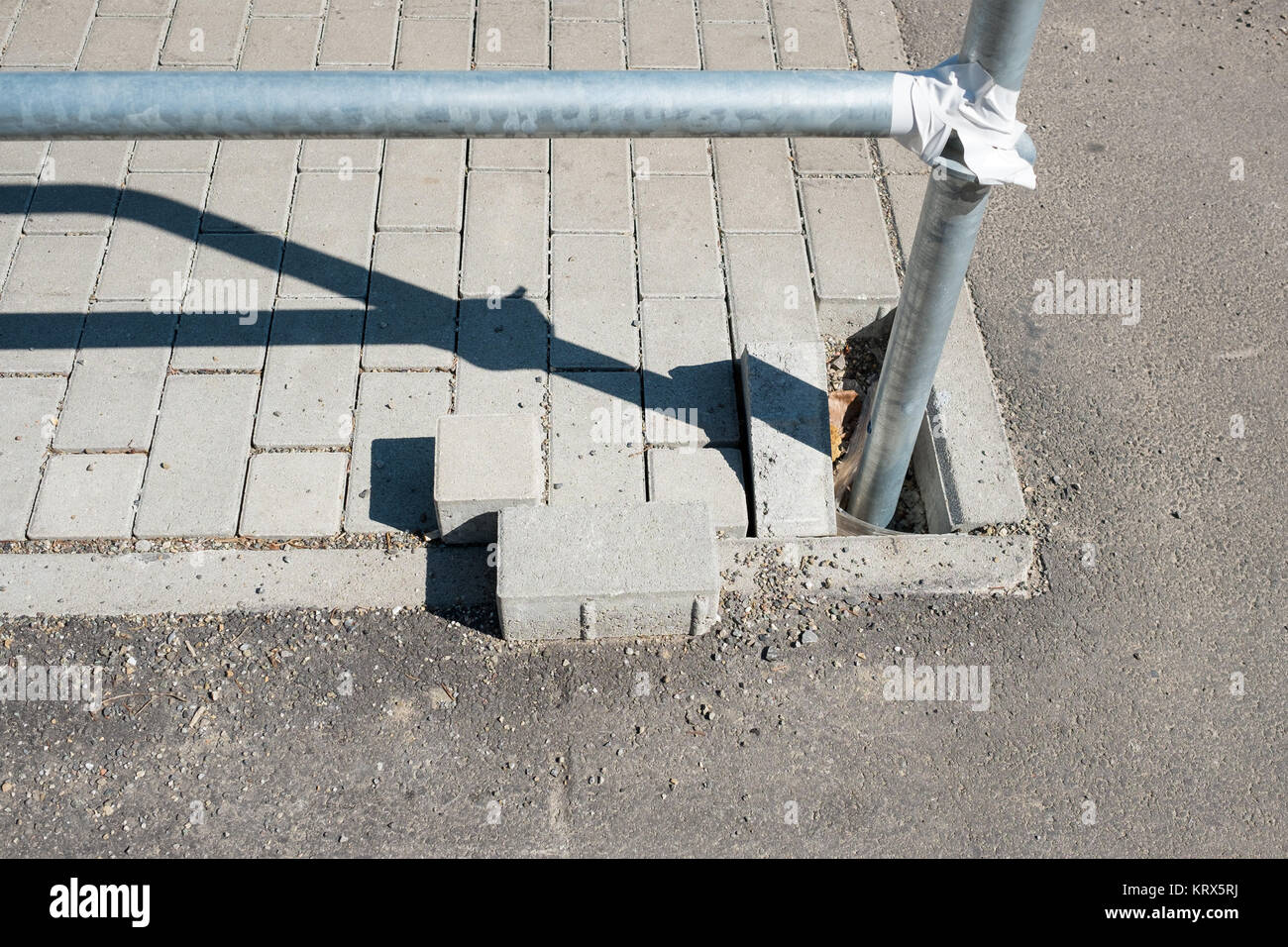 railings made of steel anchored in concrete paving stone Stock Photo ...