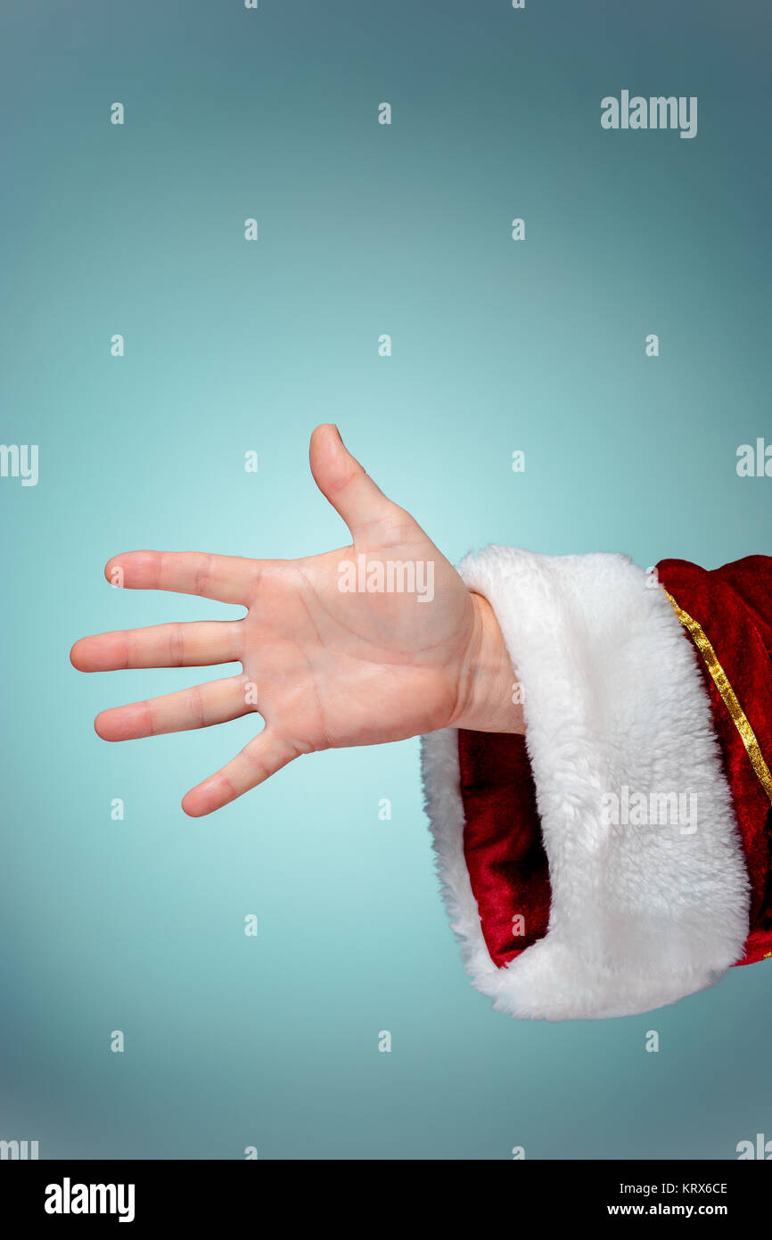 Photo of Santa Claus hand in pointing gesture Stock Photo - Alamy