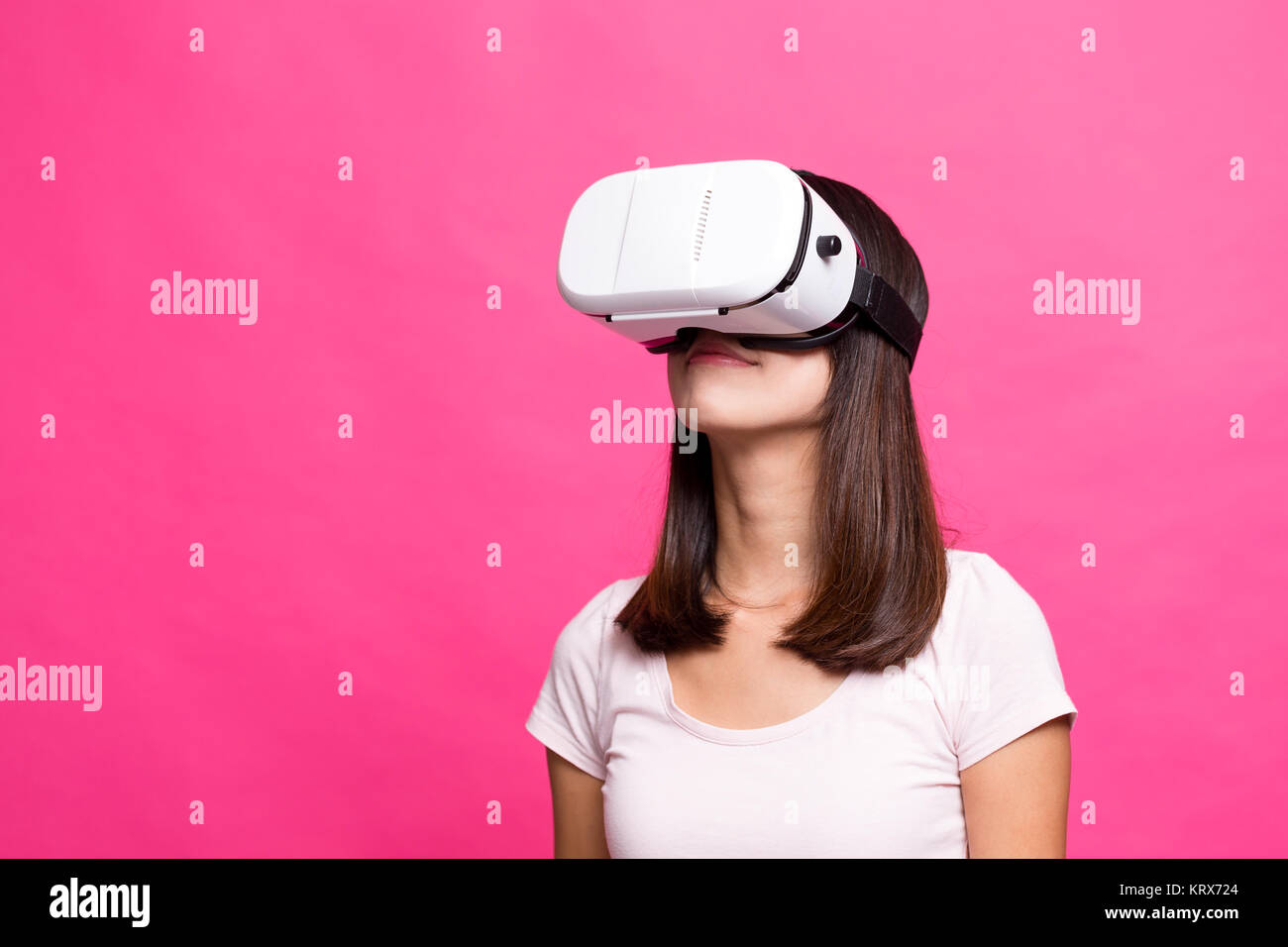 Woman wearing VR device Stock Photo - Alamy