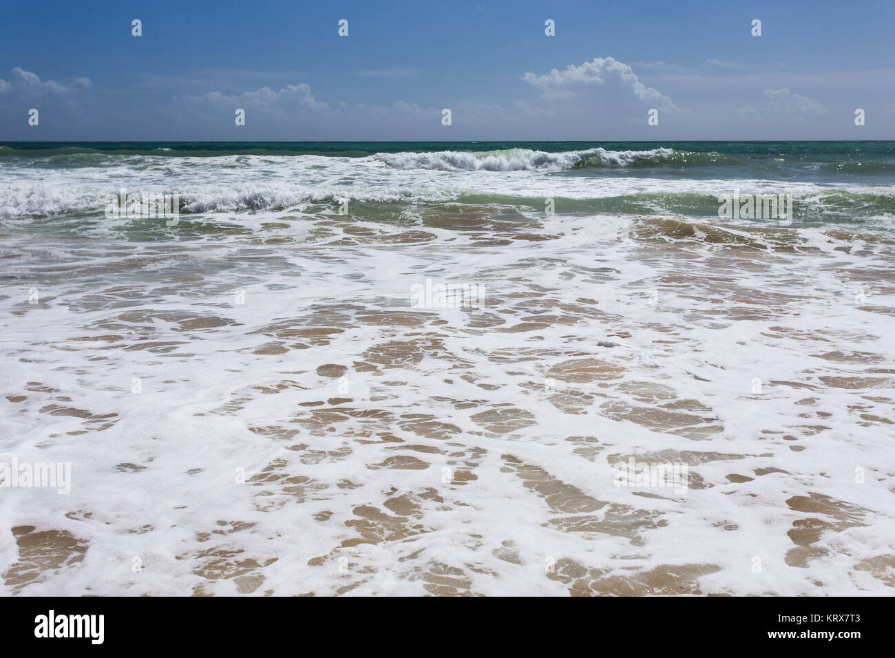 Beautiful mediterranean water lapping on the shore Stock Photo - Alamy