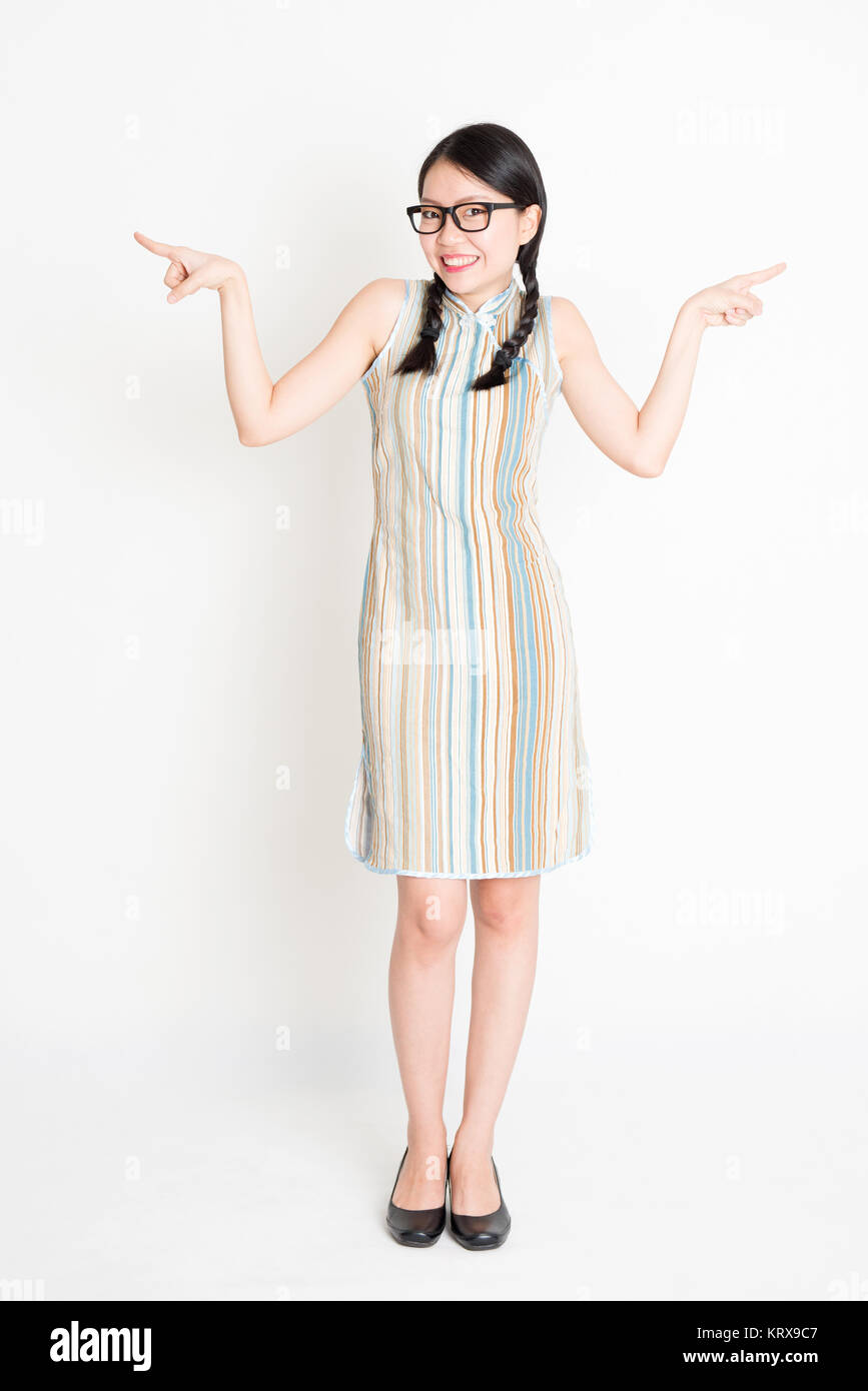 Asian woman fingers pointing at side Stock Photo - Alamy
