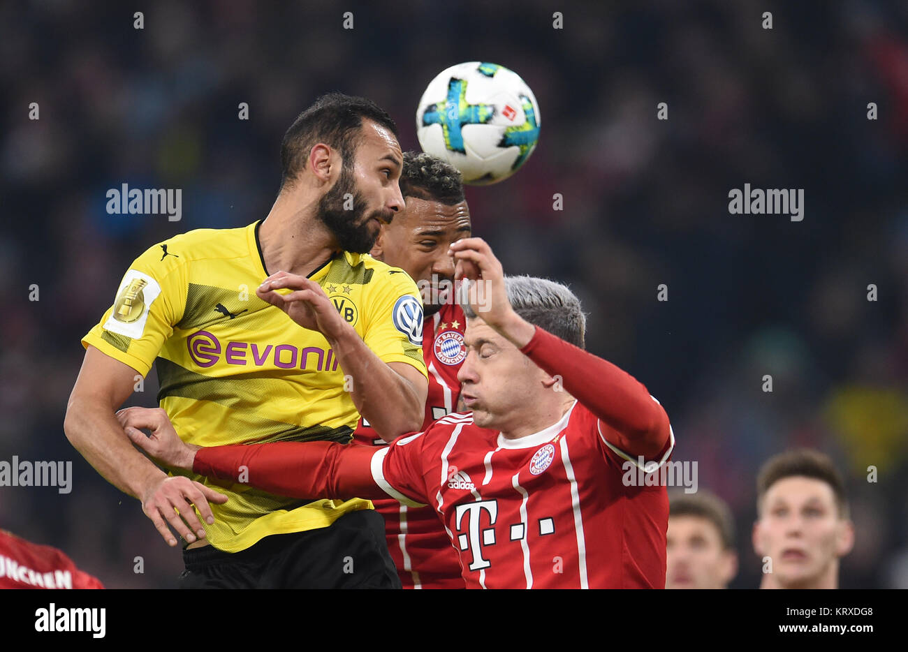 Munich, Germany. 20th Dec, 2017. Munich's Jerome Boateng (c) and Robert ...