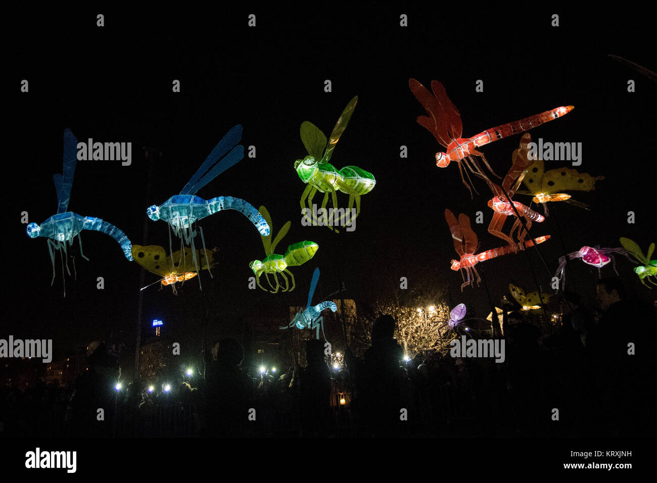 Madrid, Spain. 21st Dec, 2017. Illuminated insects are carried during ...