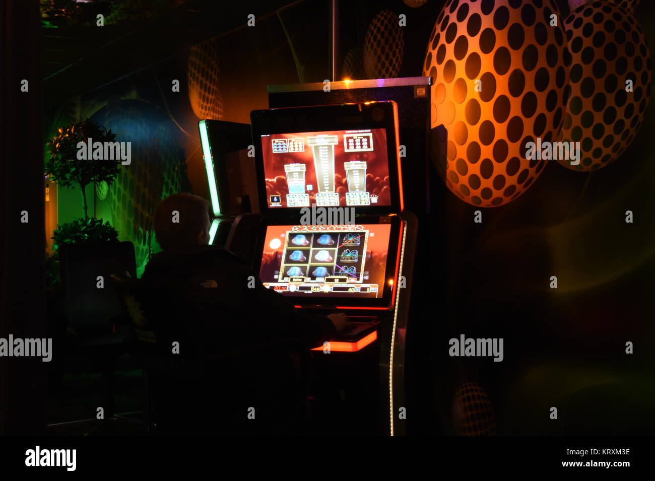 Munich, Germany. 19th Dec, 2017. The gambling machines shine bright at ...