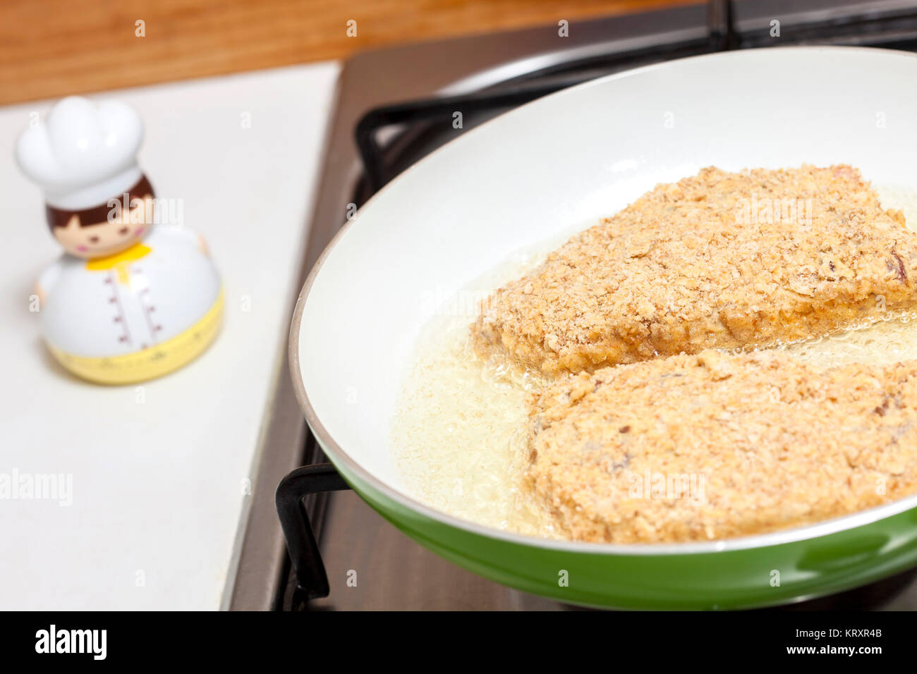 Cordon bleu preparation : Frying a cordon bleu Stock Photo - Alamy