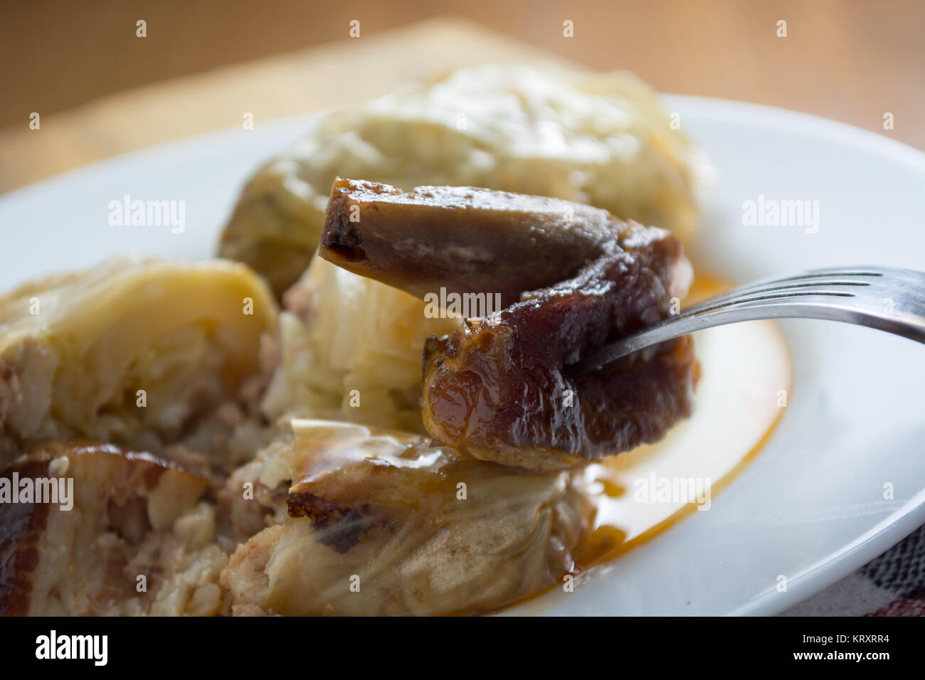 Serbian dish sarma served in white plate Stock Photo - Alamy