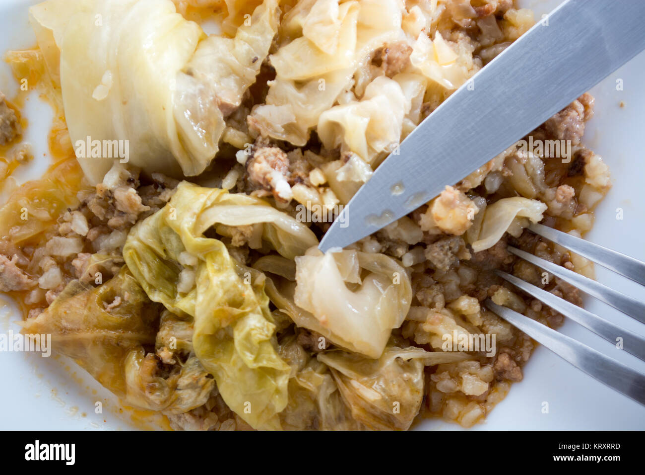 Serbian dish sarma served in white plate Stock Photo - Alamy