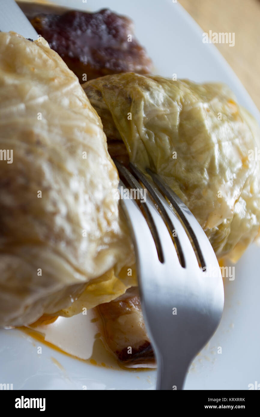 Serbian dish sarma served in white plate Stock Photo - Alamy