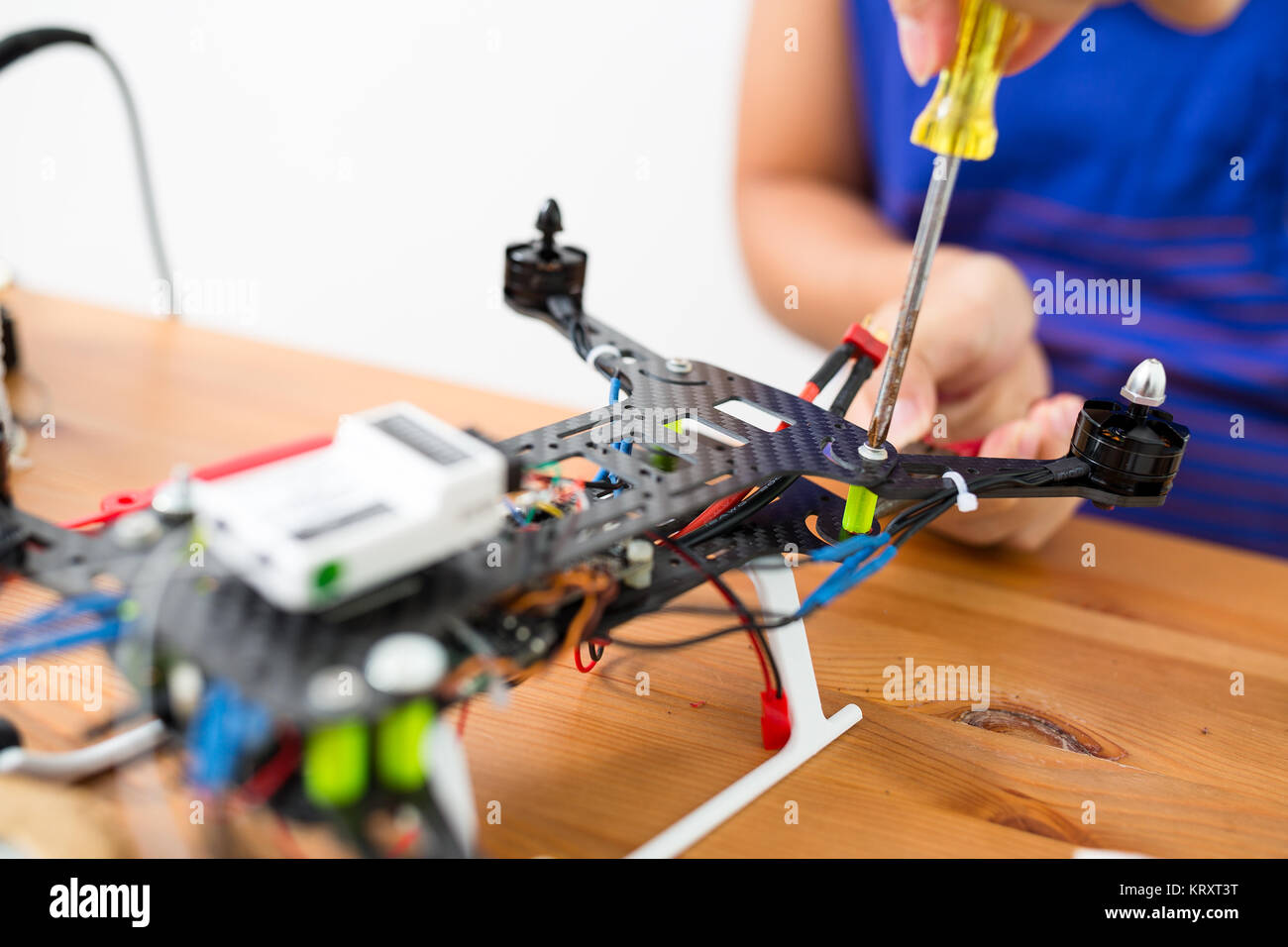 Connecting the component on drone Stock Photo - Alamy