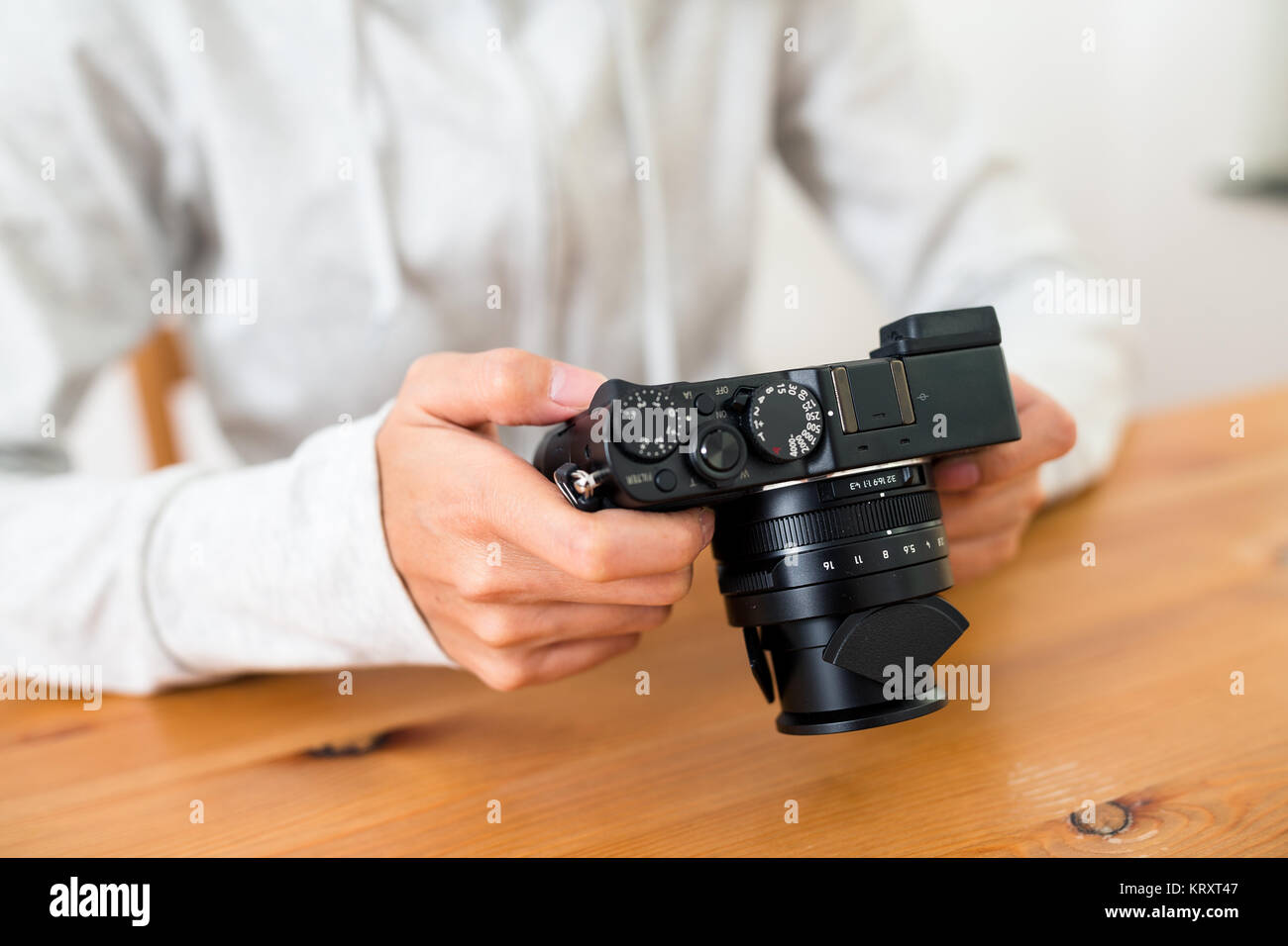 Woman using digital camera Stock Photo - Alamy