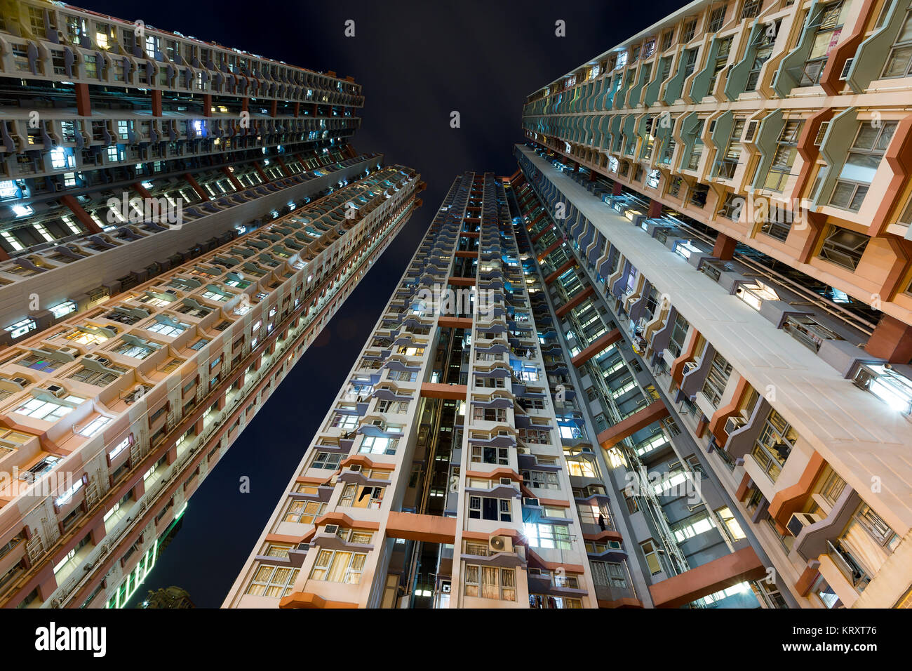 Apartment building from low angle at night Stock Photo - Alamy