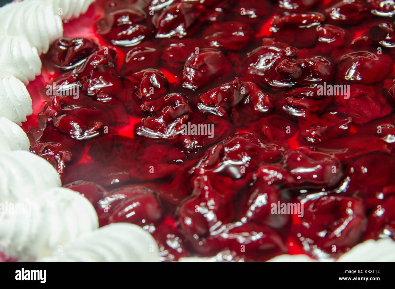 Cherry top of the cake Stock Photo - Alamy
