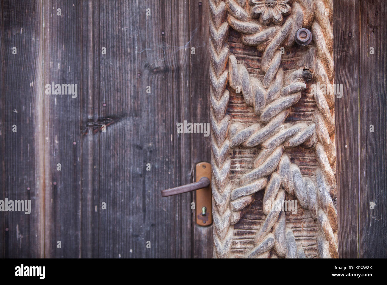 Wooden carved column Stock Photo - Alamy