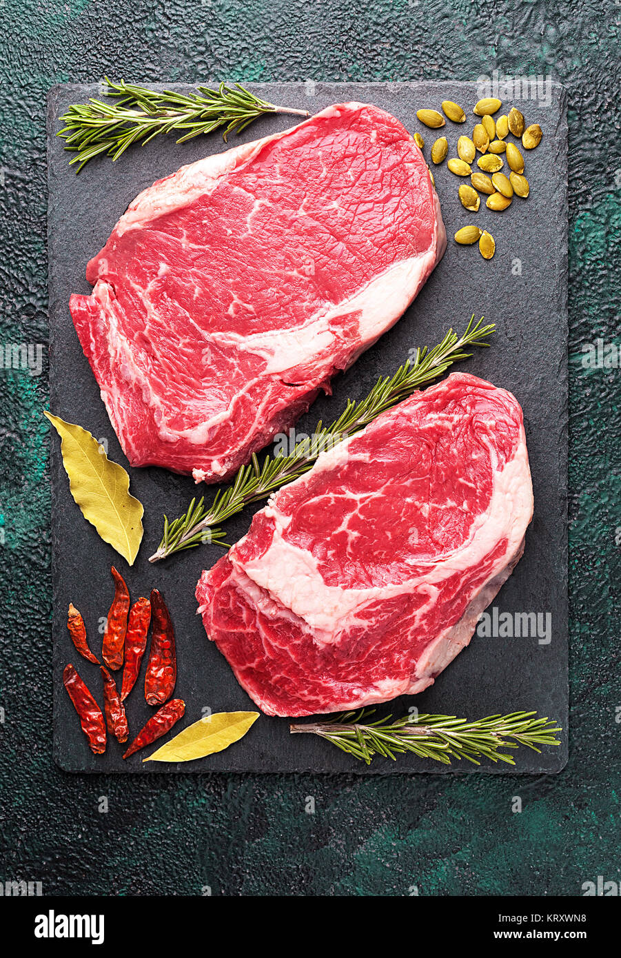 Piece of raw meat beef top view Stock Photo - Alamy