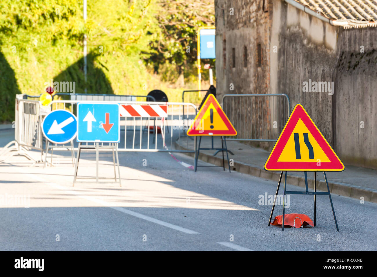 Road sign lane narrowing Stock Photo - Alamy