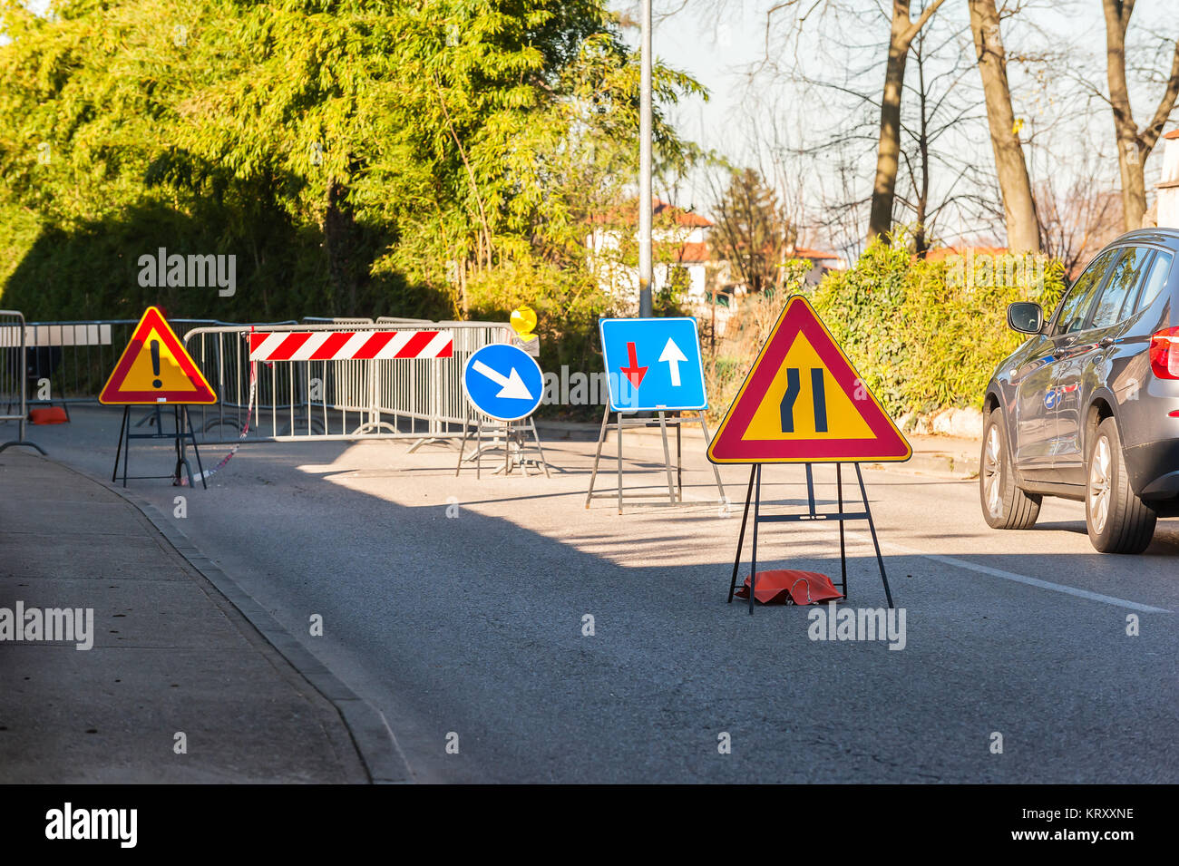 Road sign lane narrowing Stock Photo - Alamy