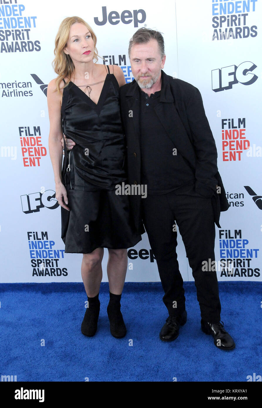 SANTA MONICA, CA - FEBRUARY 25: Actor Tim Roth (R) and Nikki Butler (L ...