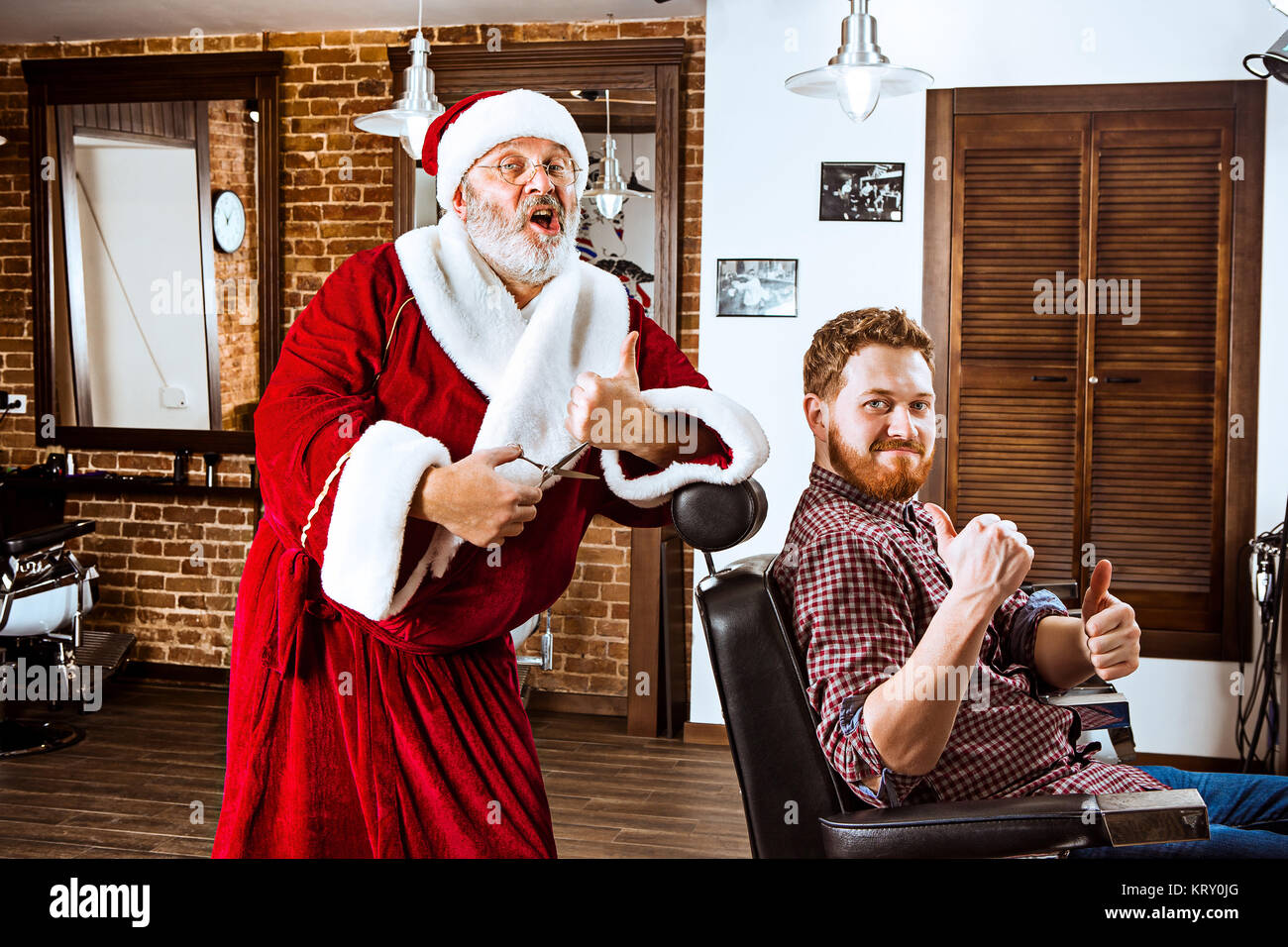 Santa claus as master at barber shop Stock Photo - Alamy
