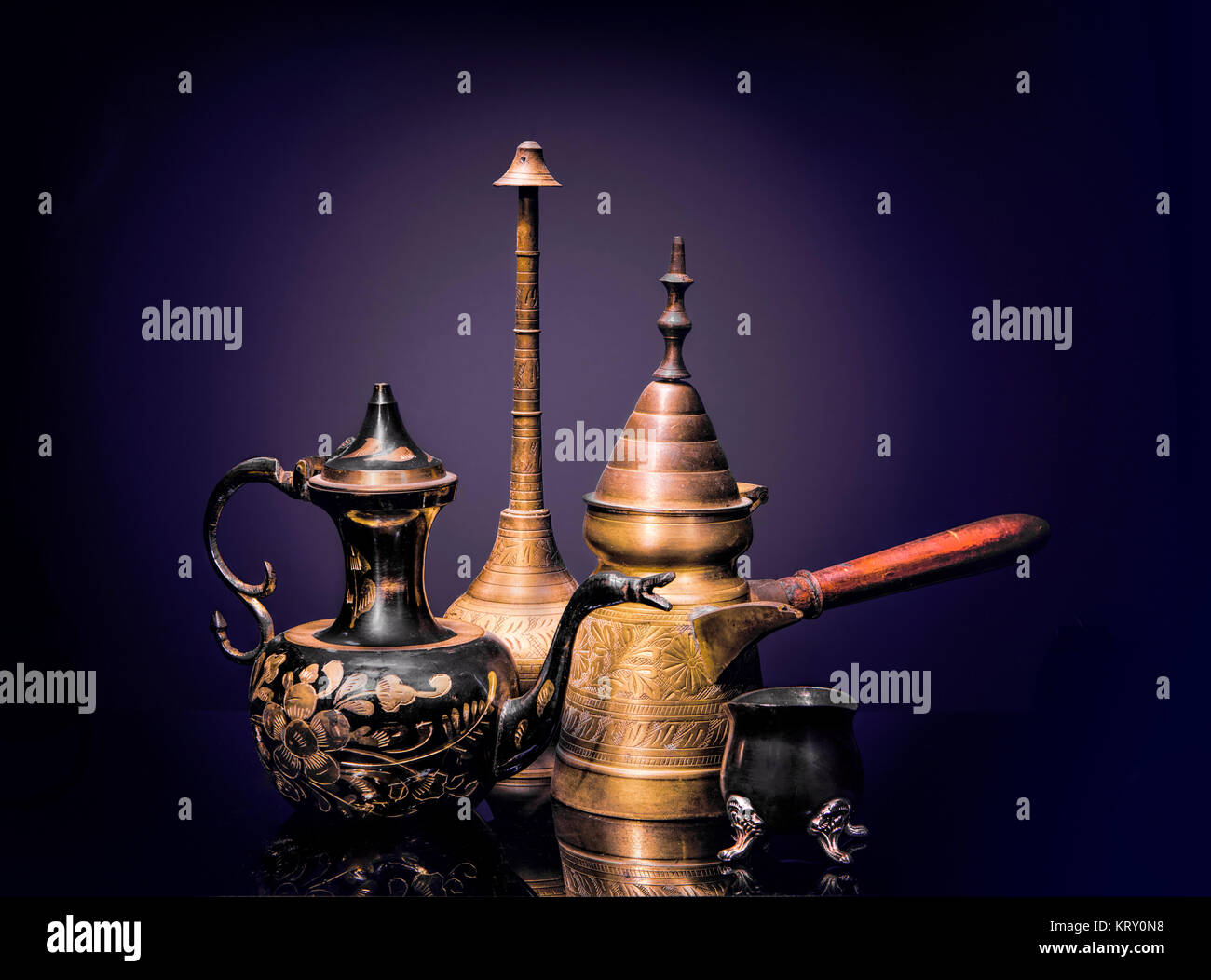 Still life, oriental motifs with a bronze coffee maker and kettle Stock ...