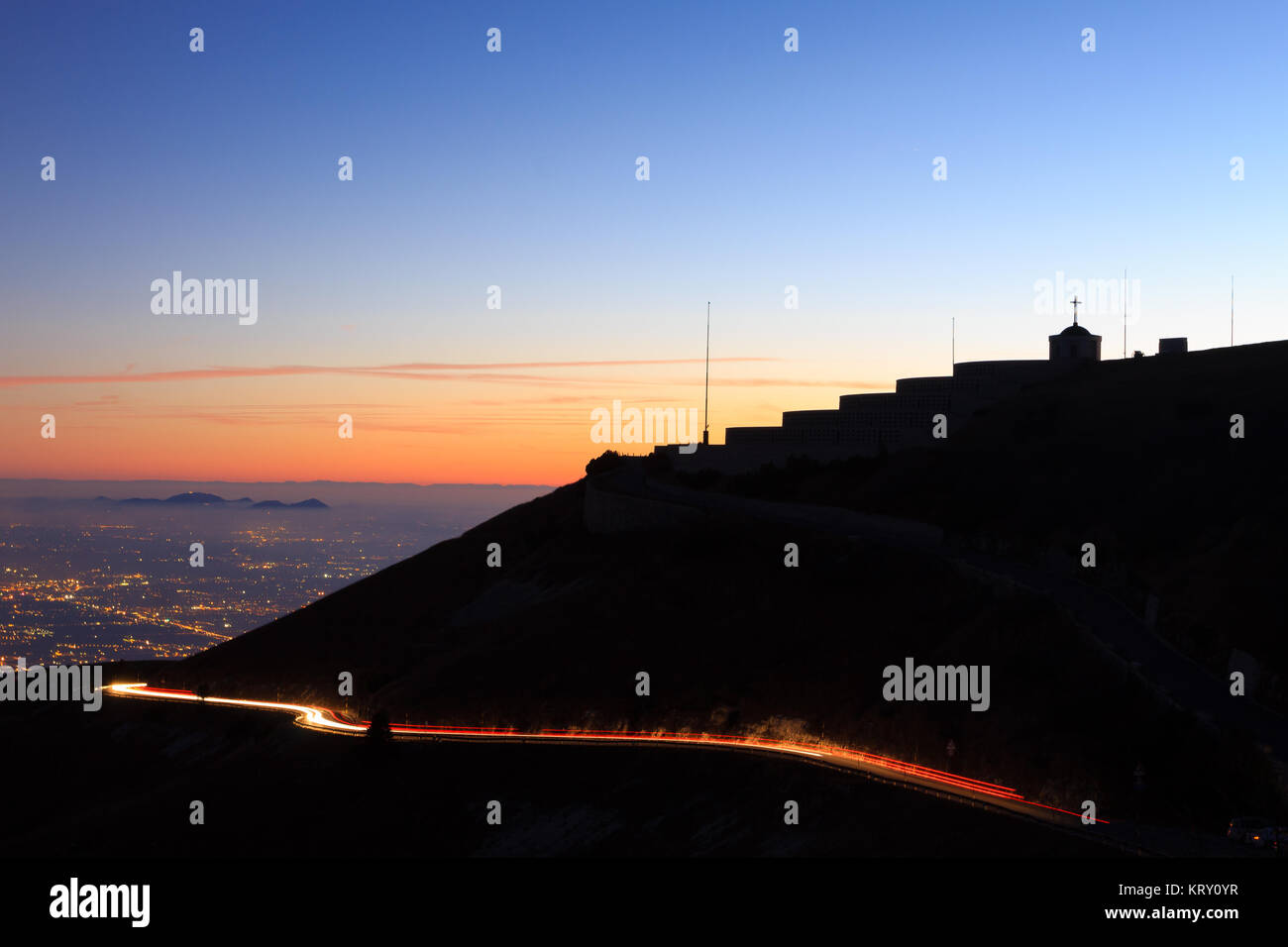 Light trails with building in silhouette Stock Photo - Alamy
