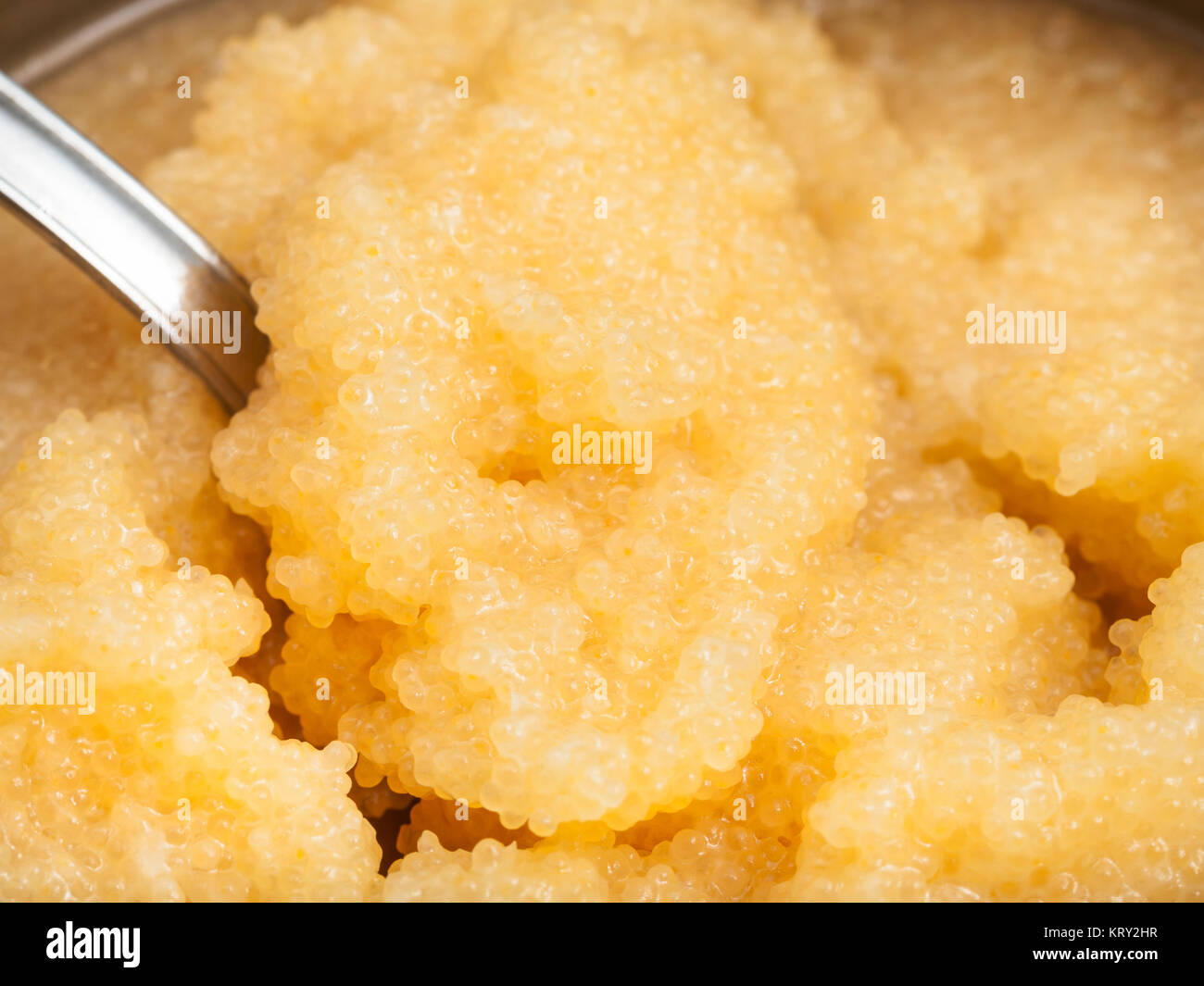 caviar of capelin fish with spoon in tin close up Stock Photo - Alamy