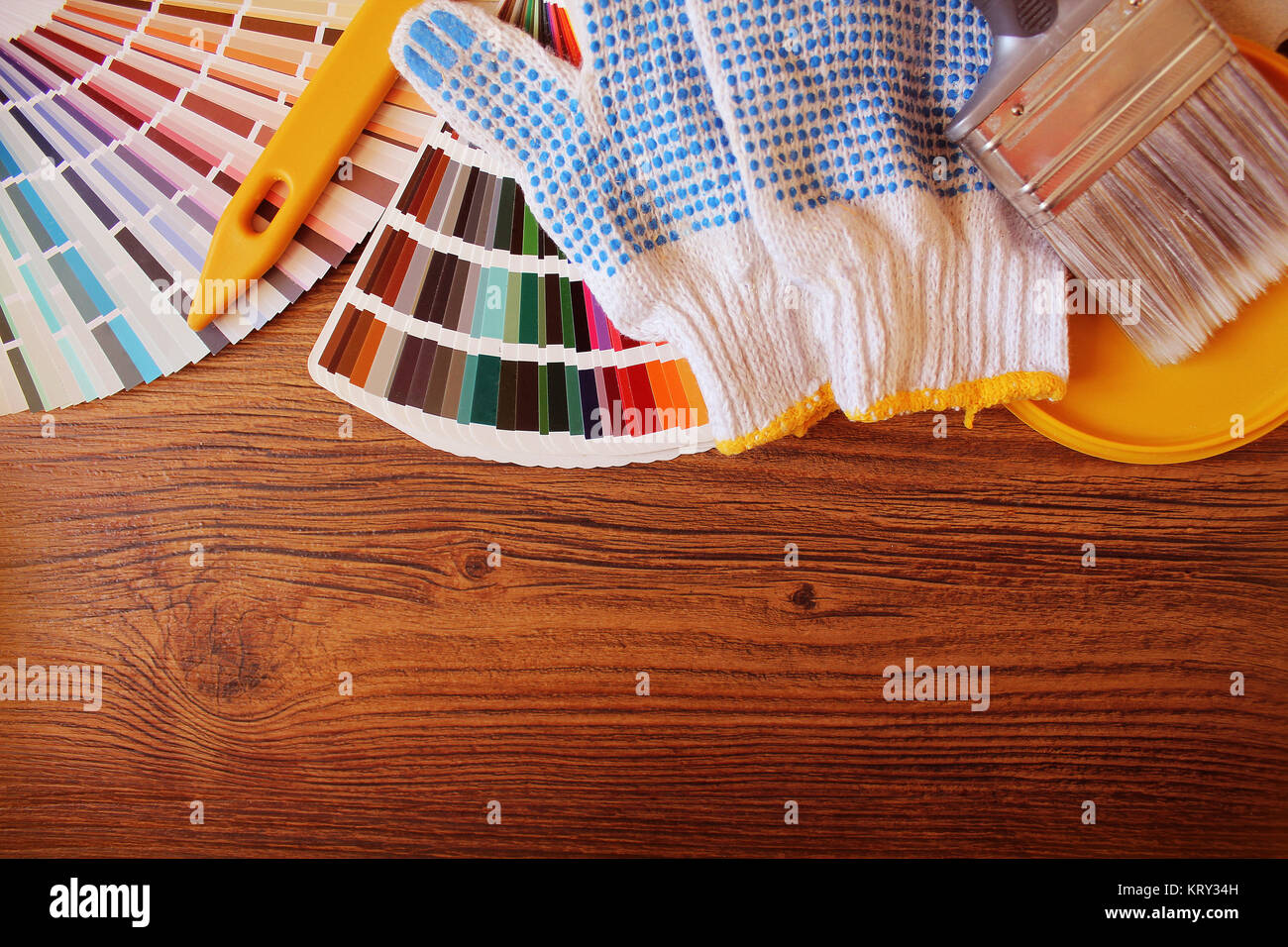 various painting tools and color samples on wooden background Stock ...