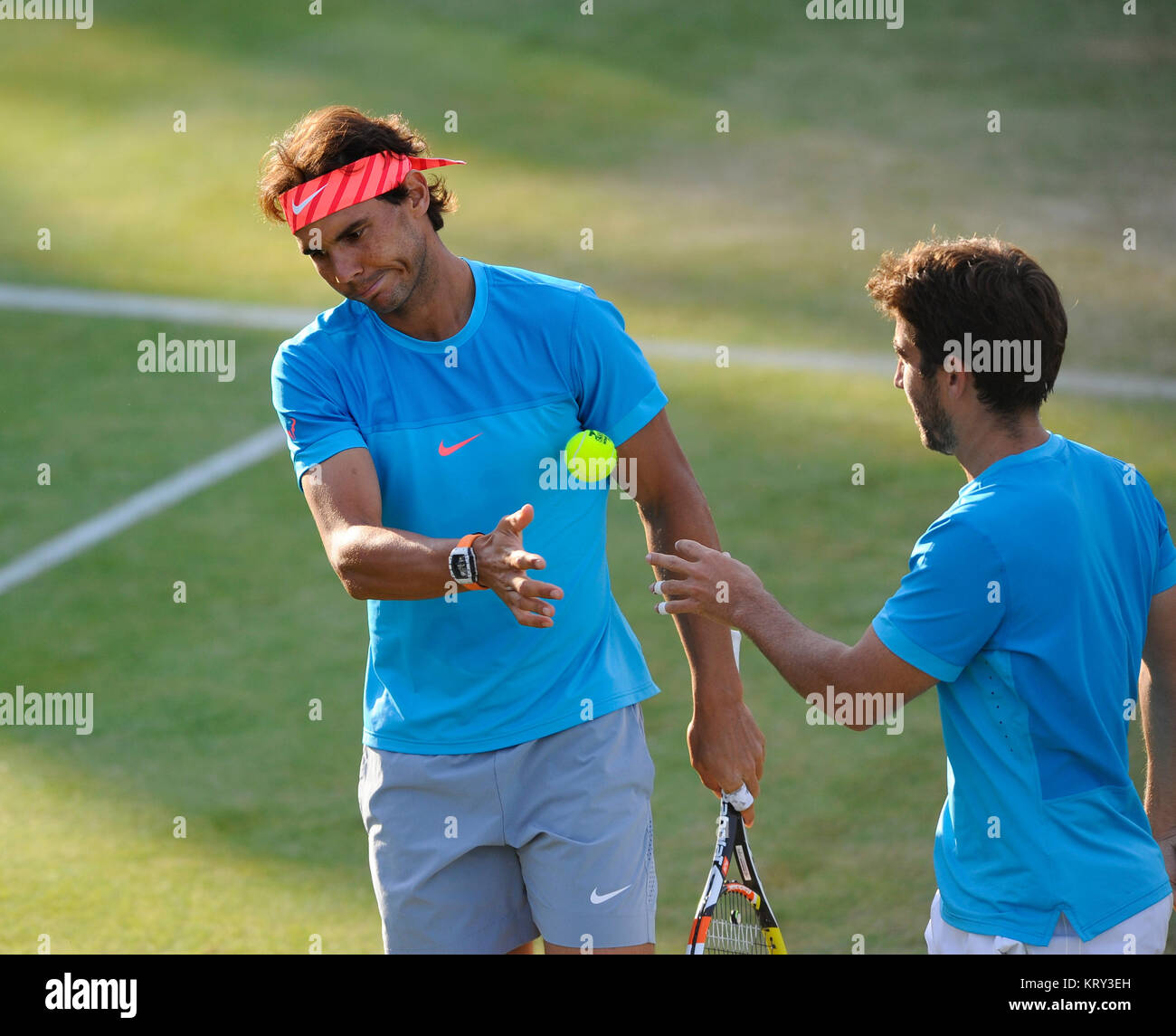 LONDON, ENGLAND - JUNE 18: Rafael Nadal and Marc Lopez during day four ...