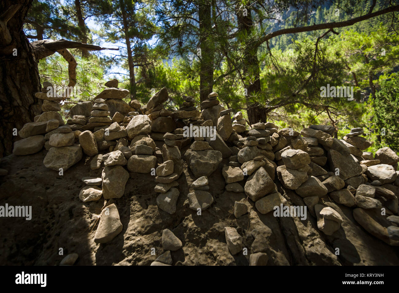 Samaria Gorge. Tourist tradition - a way of stones in the form of ...