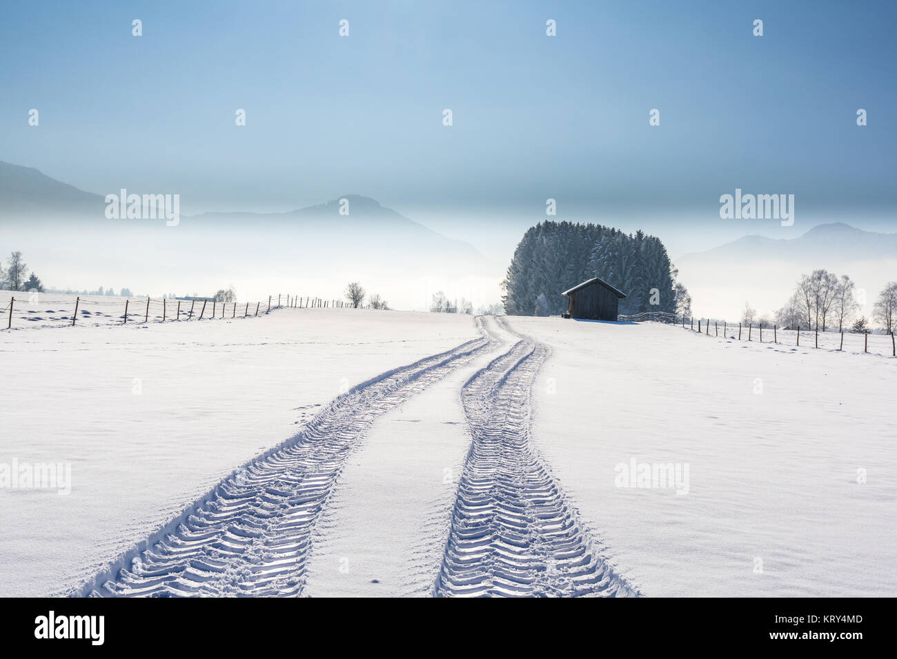 tractor tracks in the snow Stock Photo - Alamy