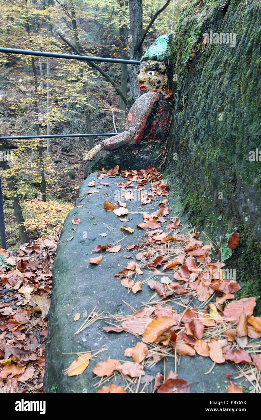 Dwarf sitting on the bench Stock Photo - Alamy