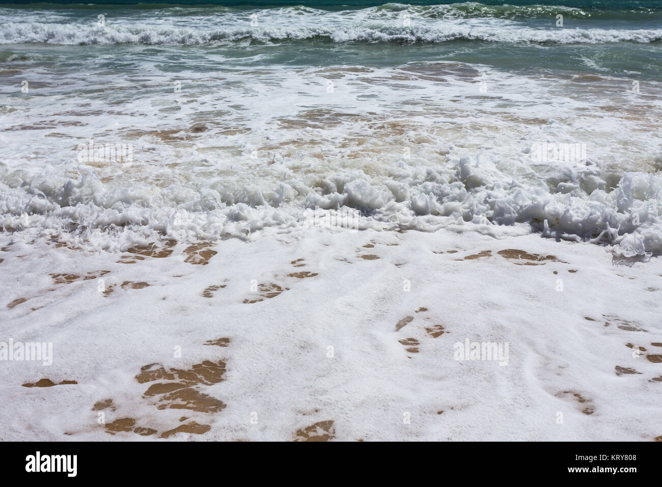 Beautiful mediterranean water lapping on the shore Stock Photo - Alamy