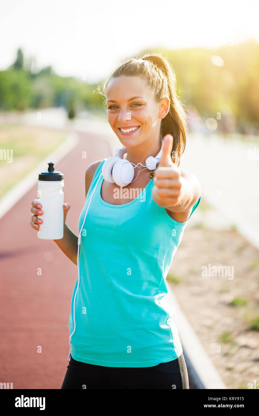 Young woman is ready for outdoor workout Stock Photo - Alamy