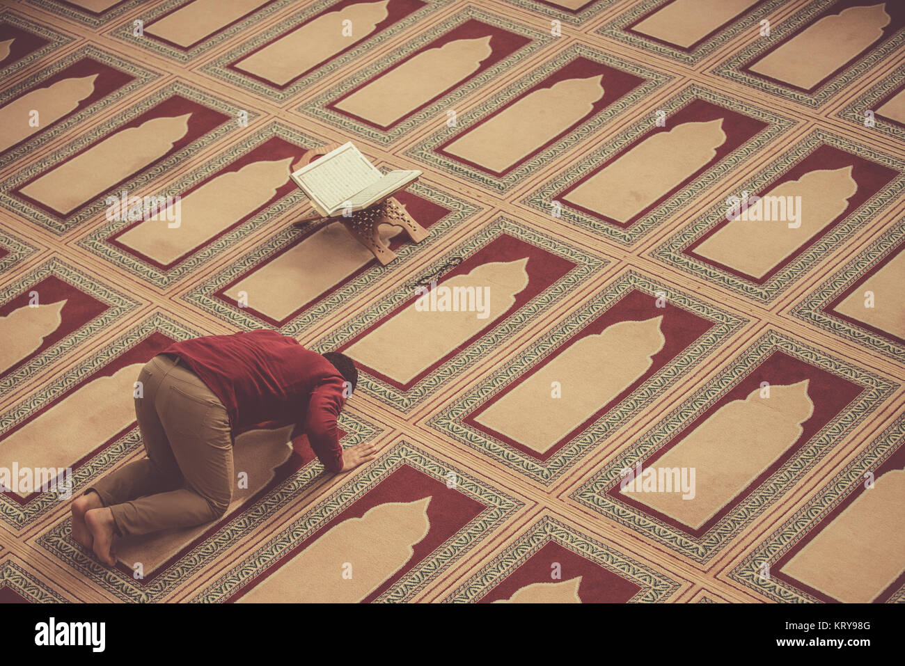 Religious muslim man praying inside the mosque Stock Photo - Alamy