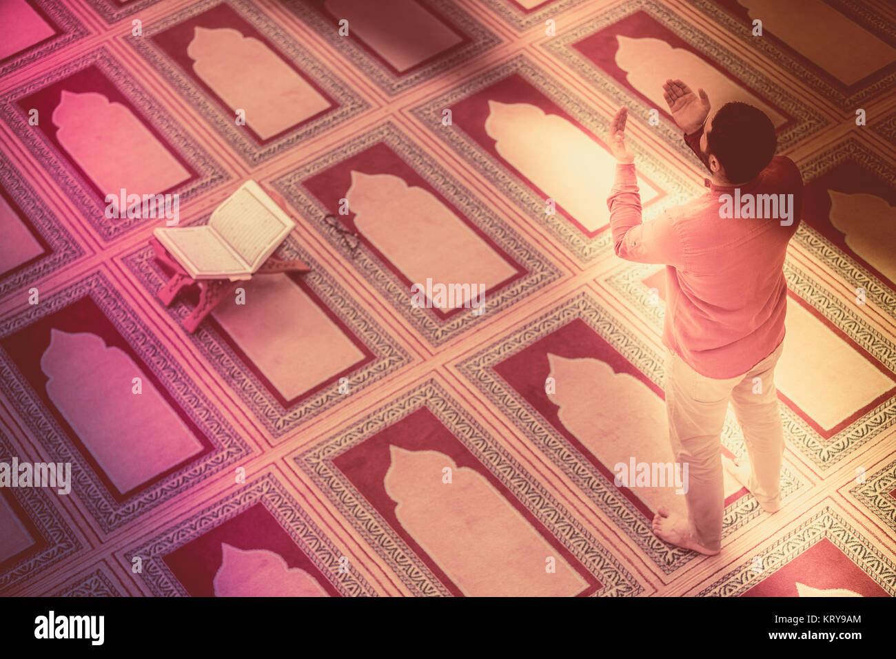 Religious muslim man praying inside the mosque Stock Photo - Alamy