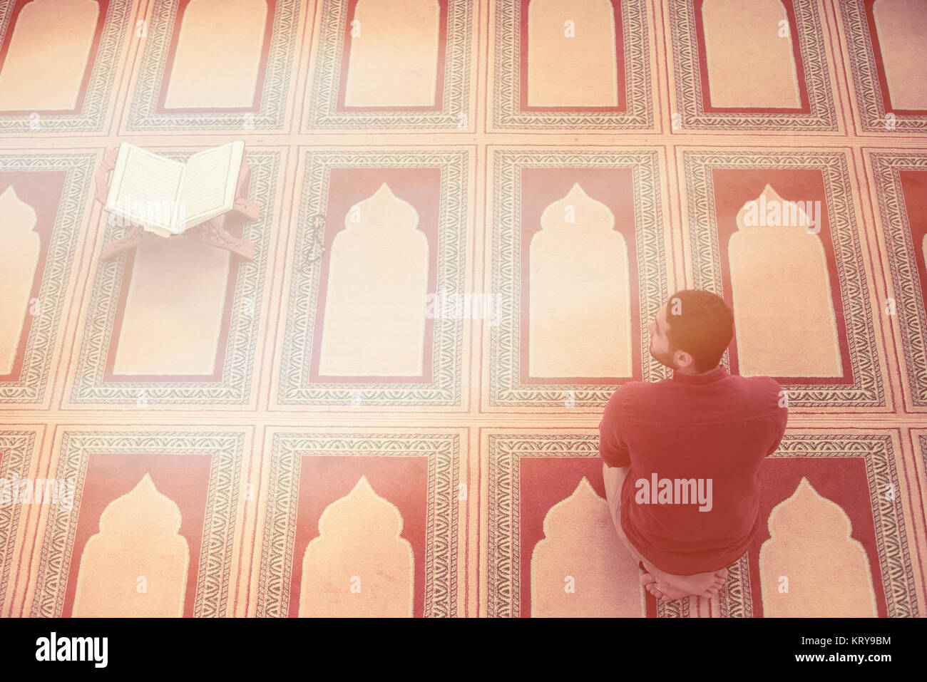 Religious muslim man praying inside the mosque Stock Photo - Alamy