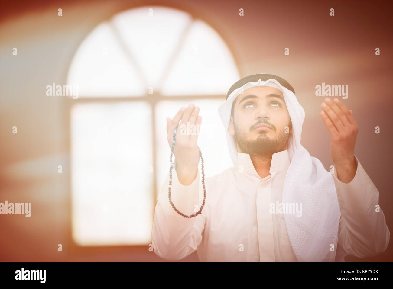 Religious muslim man praying inside the mosque Stock Photo - Alamy